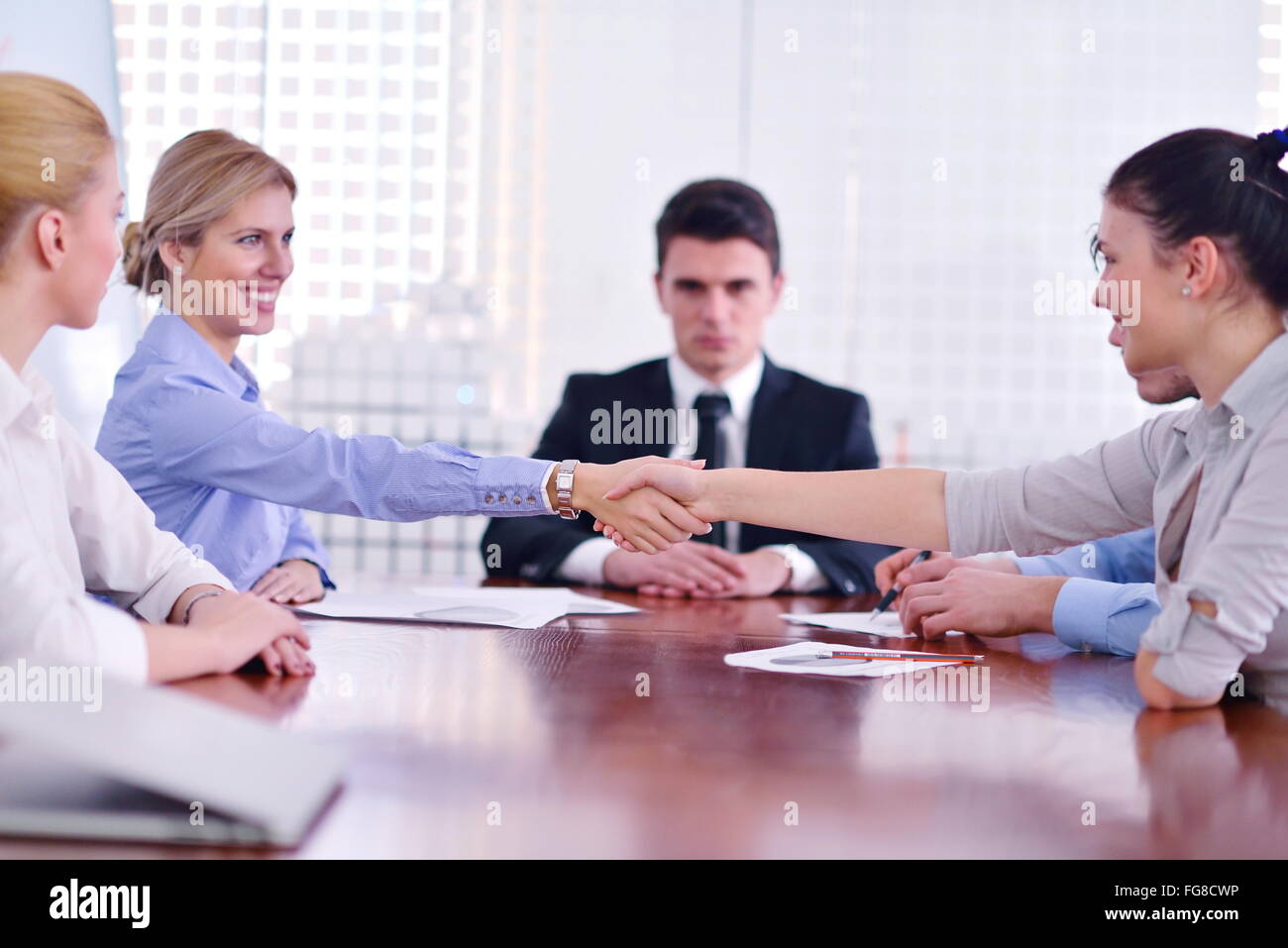 business people making a deal at meeting Stock Photo - Alamy