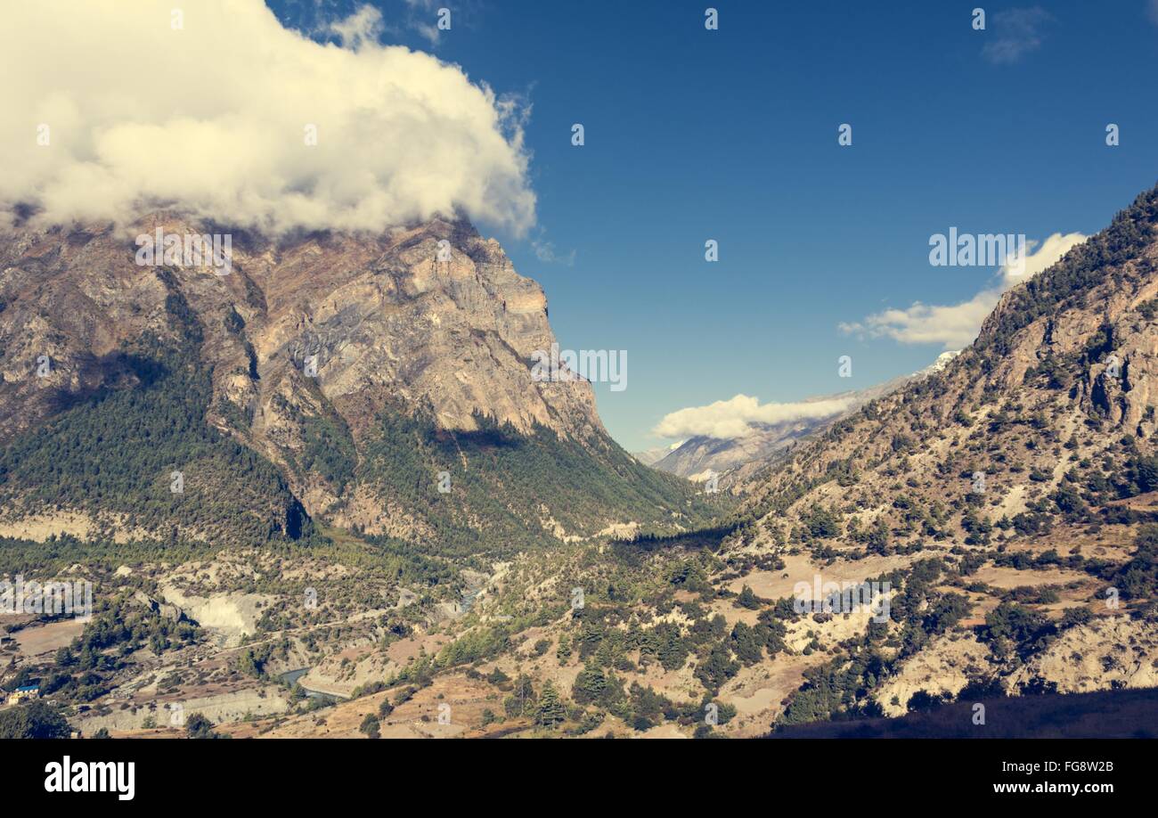 Wide mountain valley with river flowing through Stock Photo - Alamy