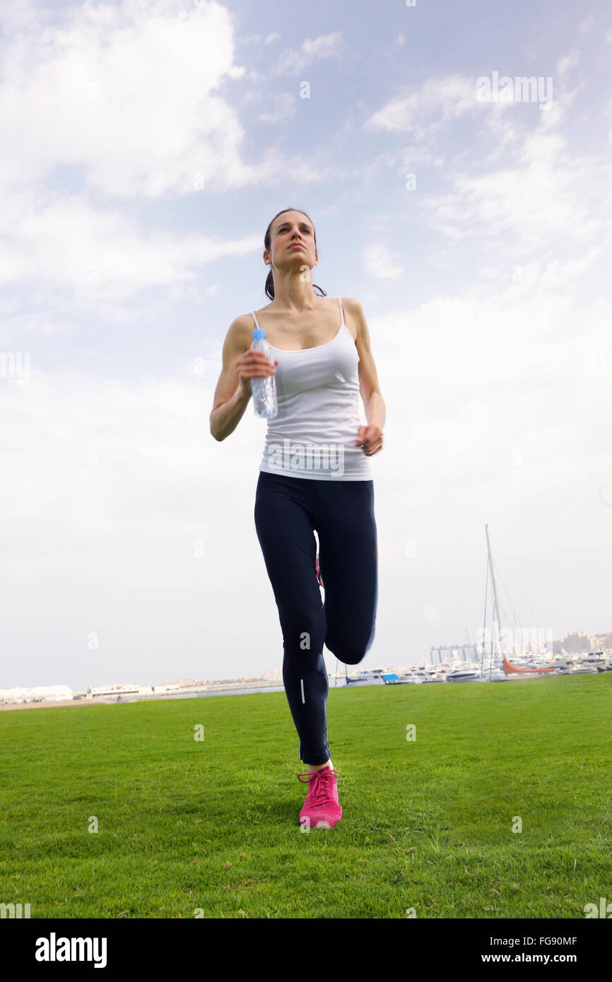 Woman sunrise run hi-res stock photography and images - Alamy