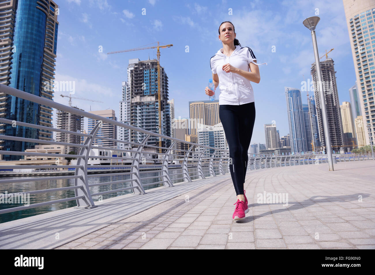 woman jogging at morning Stock Photo - Alamy