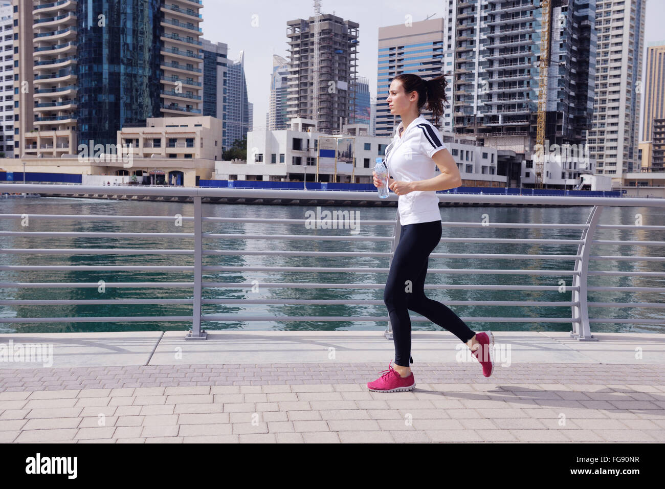 Woman sunrise run hi-res stock photography and images - Alamy