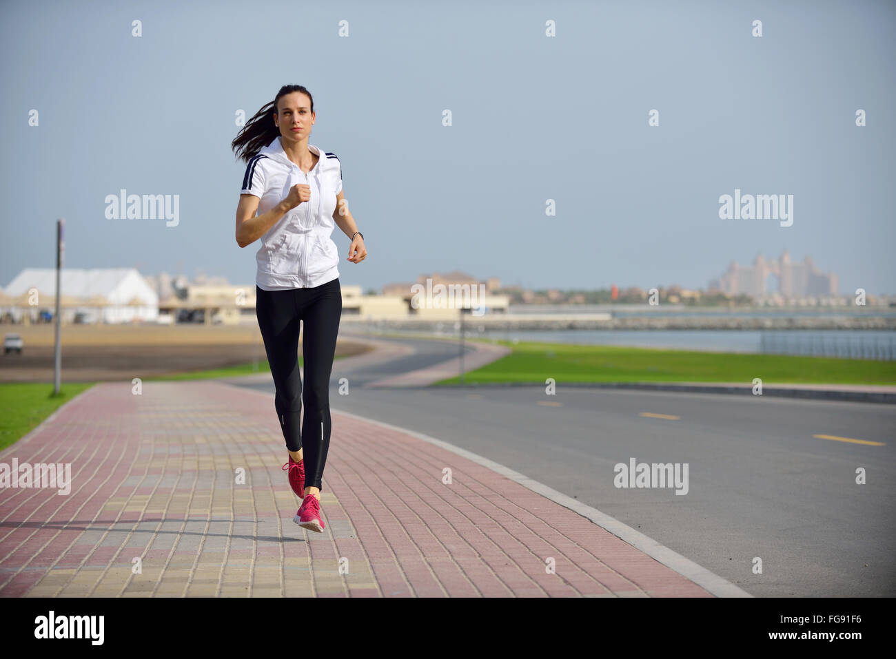 woman jogging at morning Stock Photo - Alamy