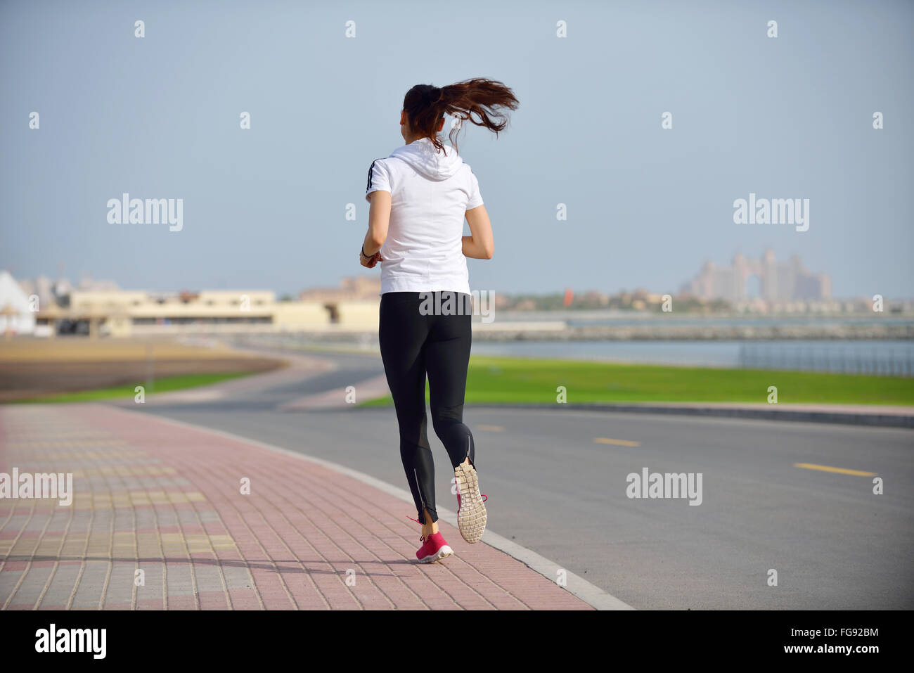 woman jogging at morning Stock Photo - Alamy