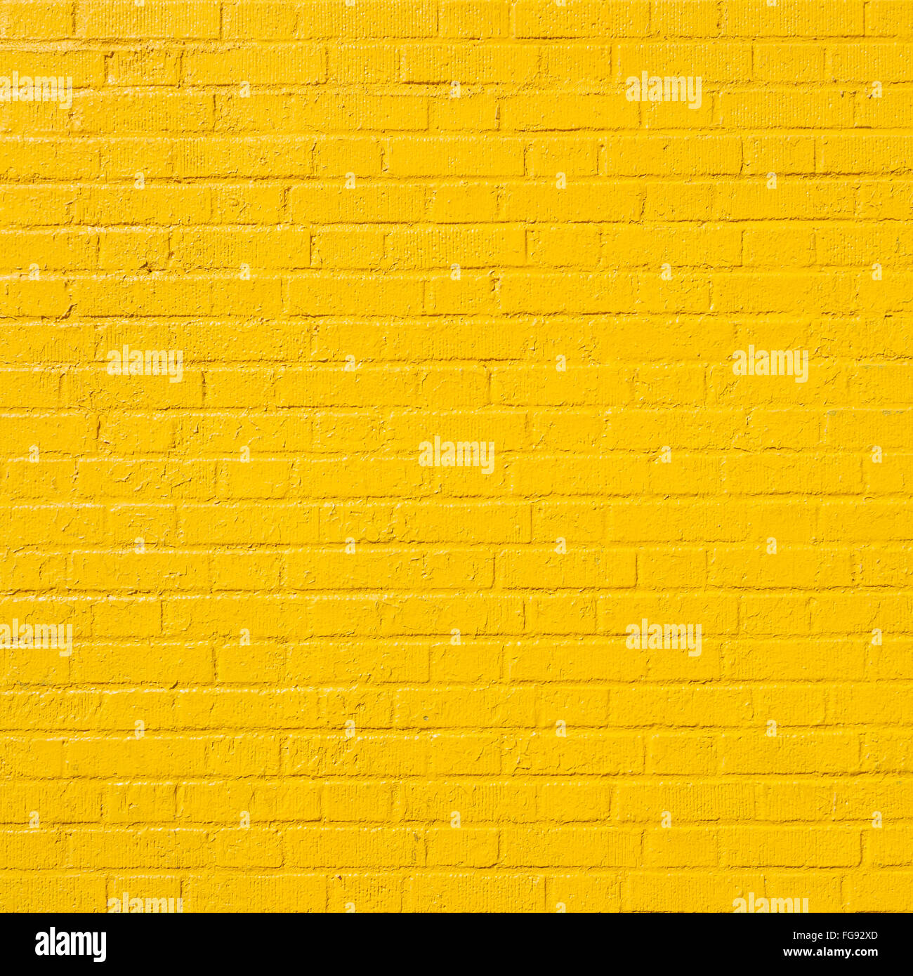 square part of bright yellow painted brick wall Stock Photo - Alamy