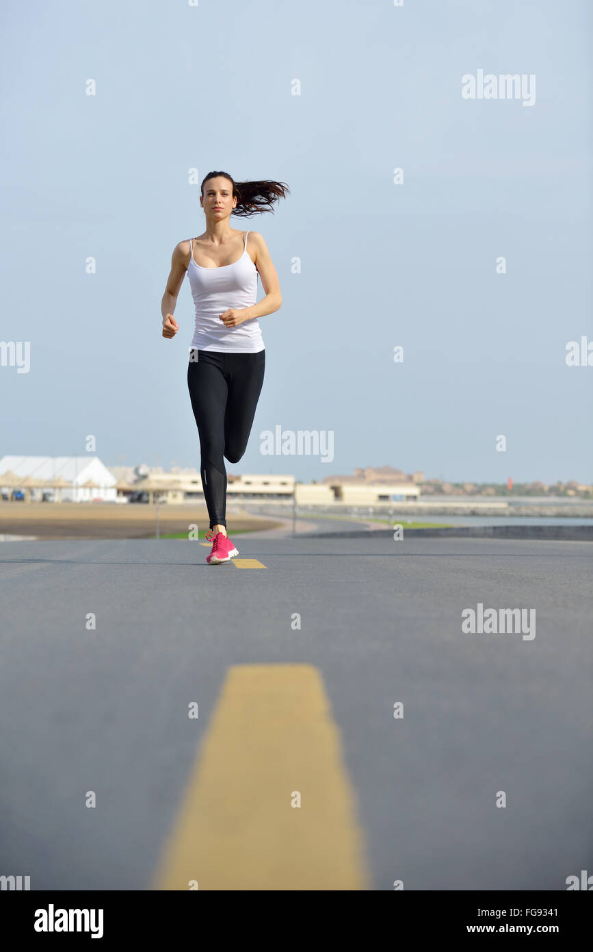 Woman sunrise run hi-res stock photography and images - Alamy