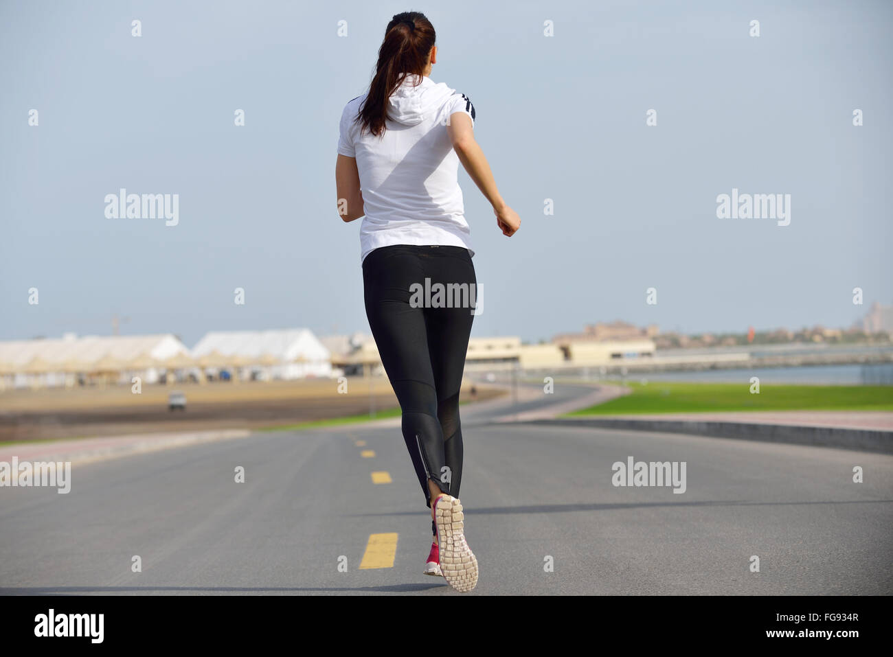 woman jogging at morning Stock Photo - Alamy