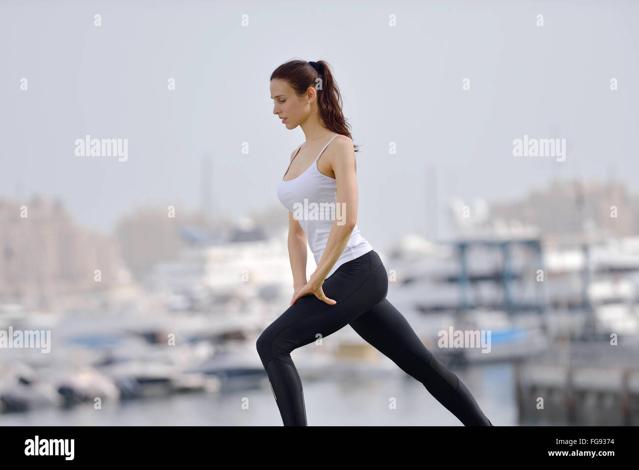 Young beautiful woman jogging on morning Stock Photo - Alamy