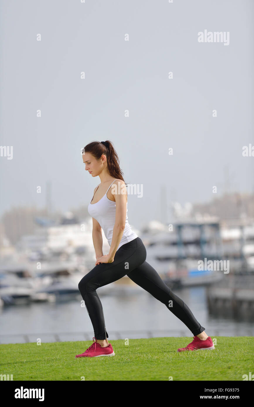 Young beautiful woman jogging on morning Stock Photo - Alamy