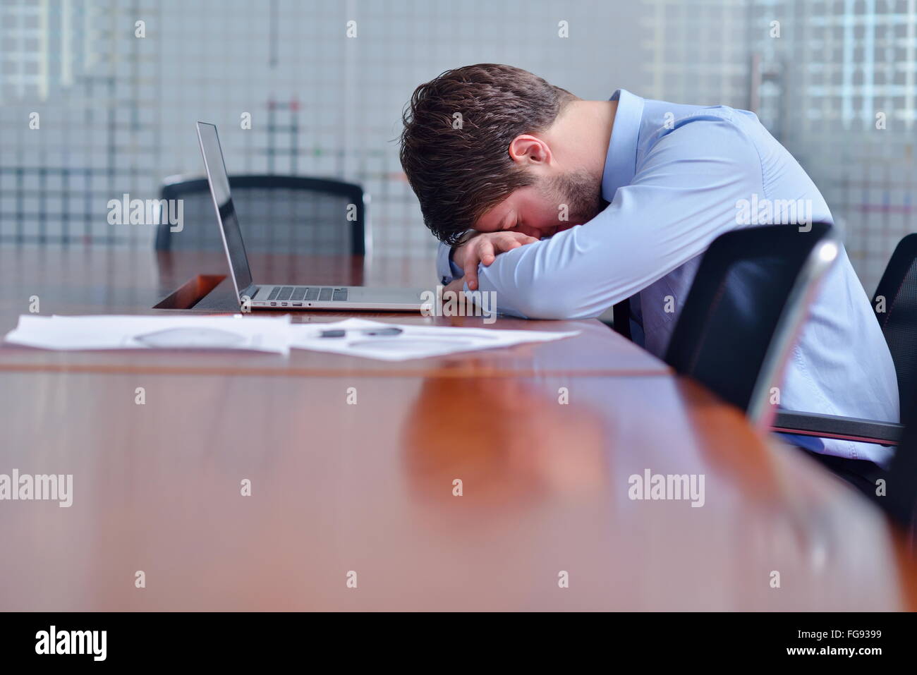 business man with problems and stress in the office Stock Photo - Alamy