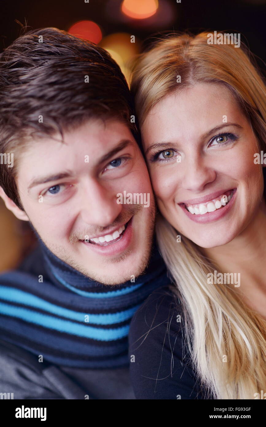 Portrait of a happy young couple Stock Photo - Alamy