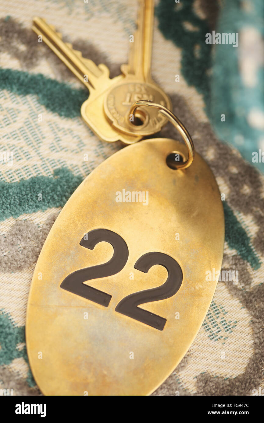 hotel keys on bed Stock Photo - Alamy
