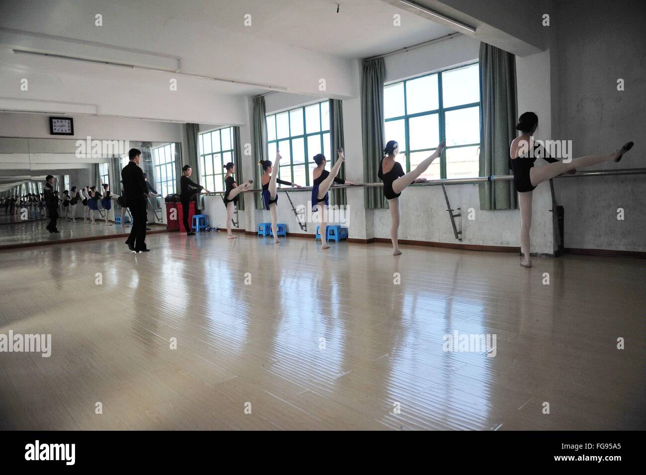 Zhumadian, China's Henan Province. 16th Feb, 2016. Students practise ...