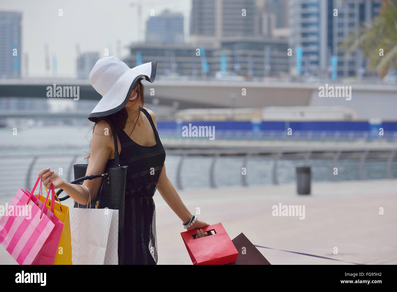 beautiful woman goes in shopping Stock Photo - Alamy