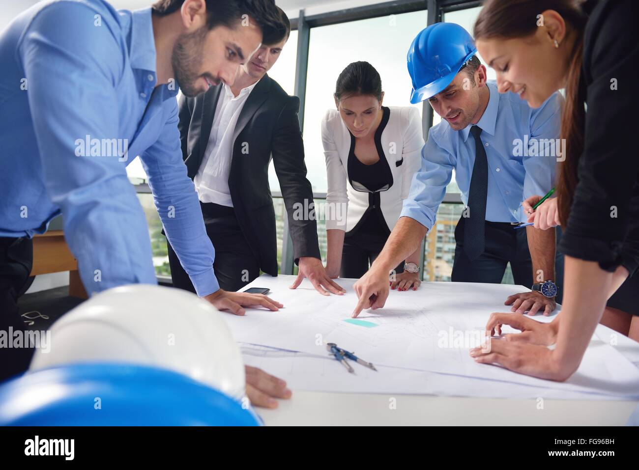 business people and engineers on meeting Stock Photo - Alamy