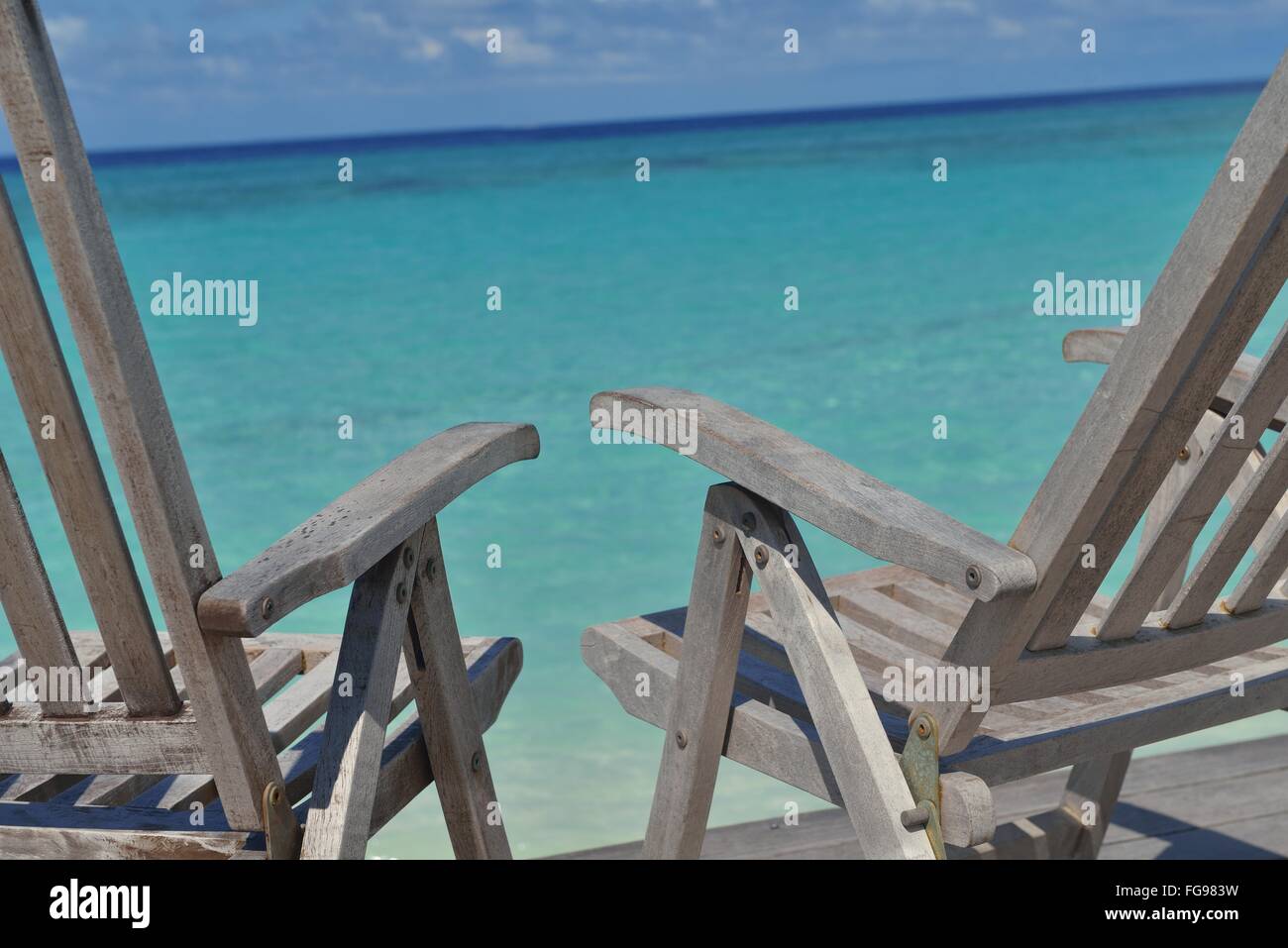 tropical beach chairs Stock Photo - Alamy
