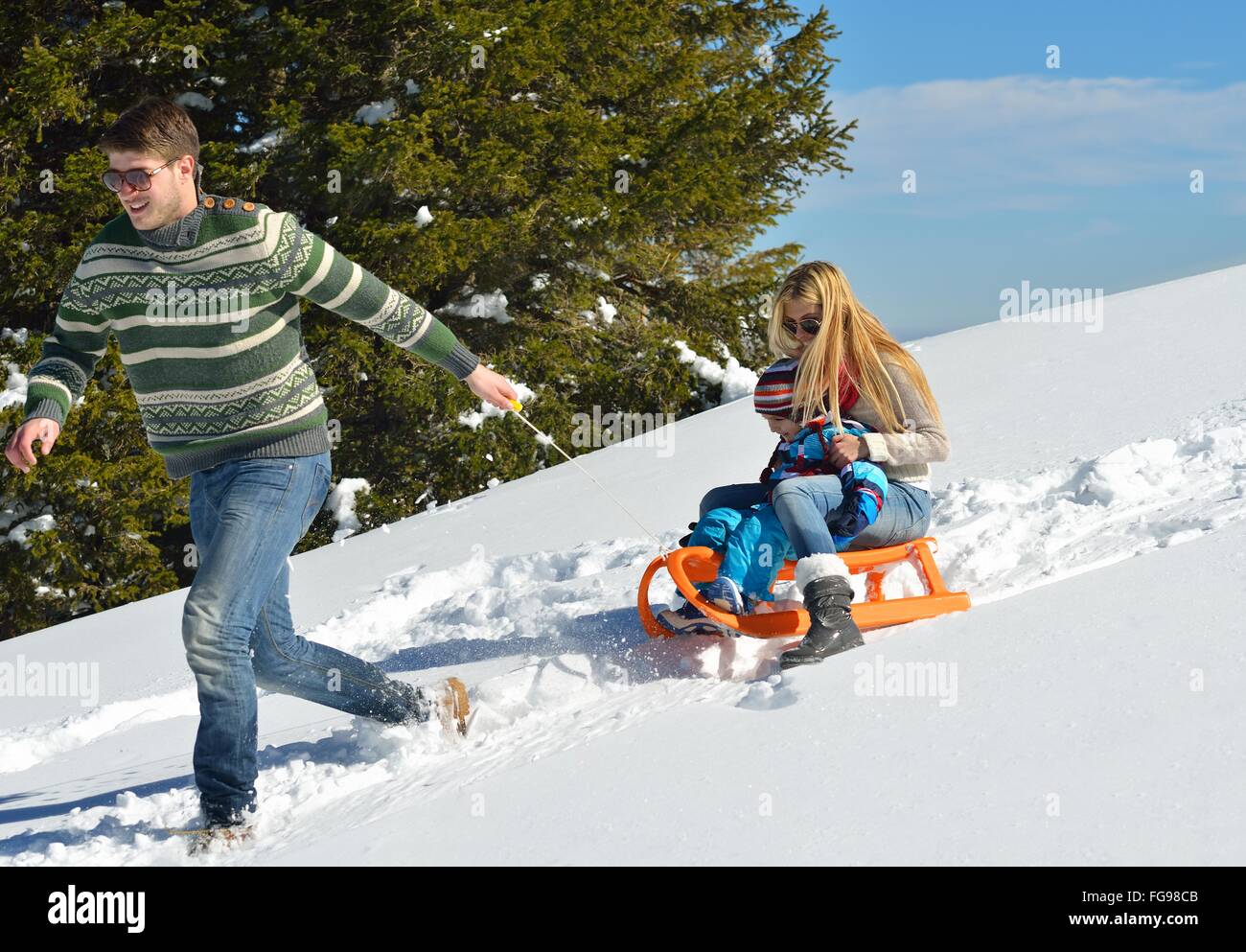 Family happy winter children hi-res stock photography and images - Alamy