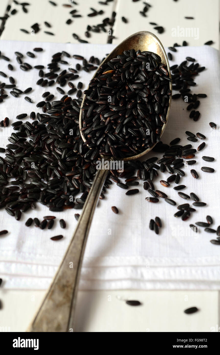 Uncooked, organic Black Rice, also known as Forbidden Rice Stock Photo ...
