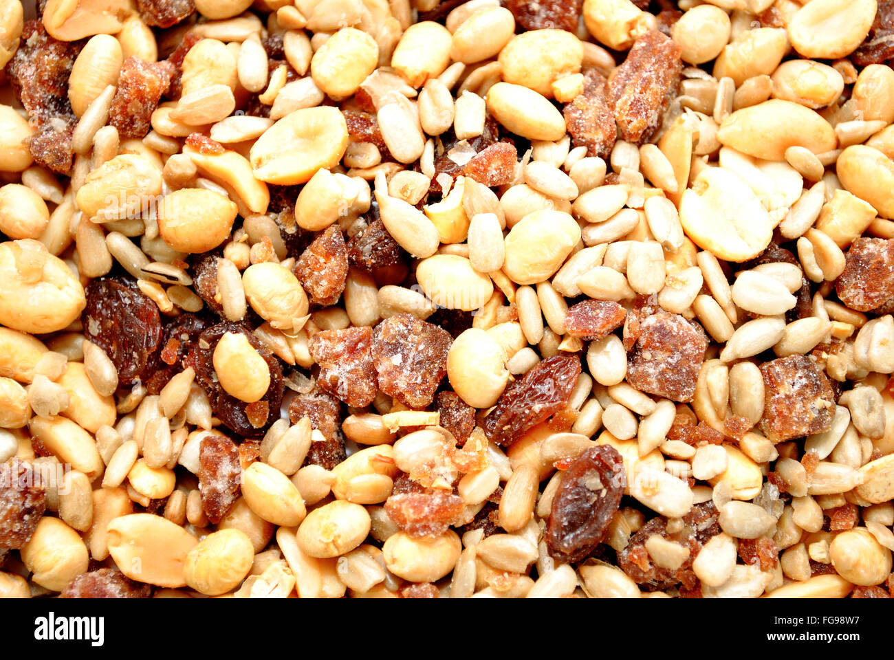 A Background of Dried Raisins and Mixed Nuts Stock Photo - Alamy