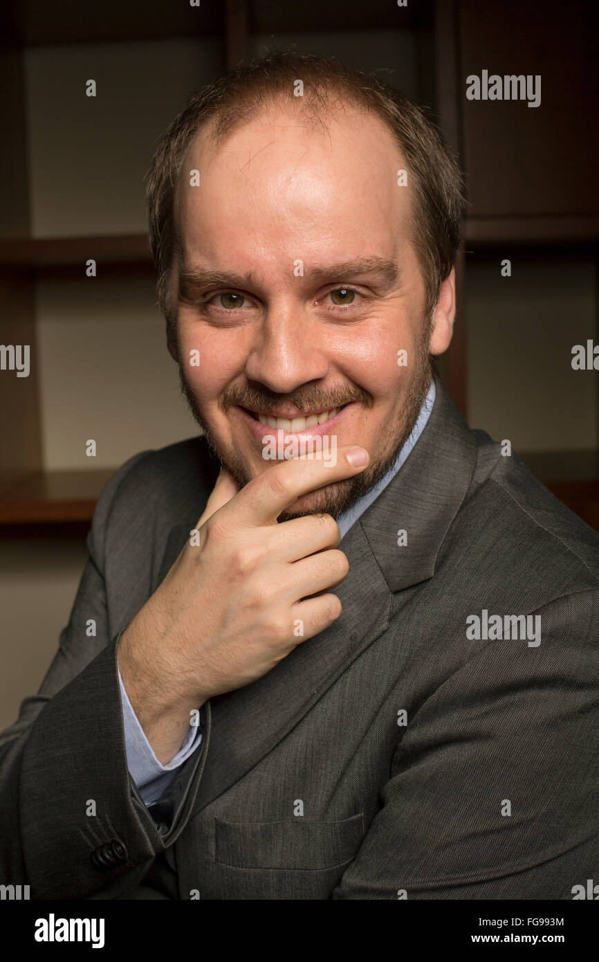 happy business man, at home office, smilling Stock Photo - Alamy
