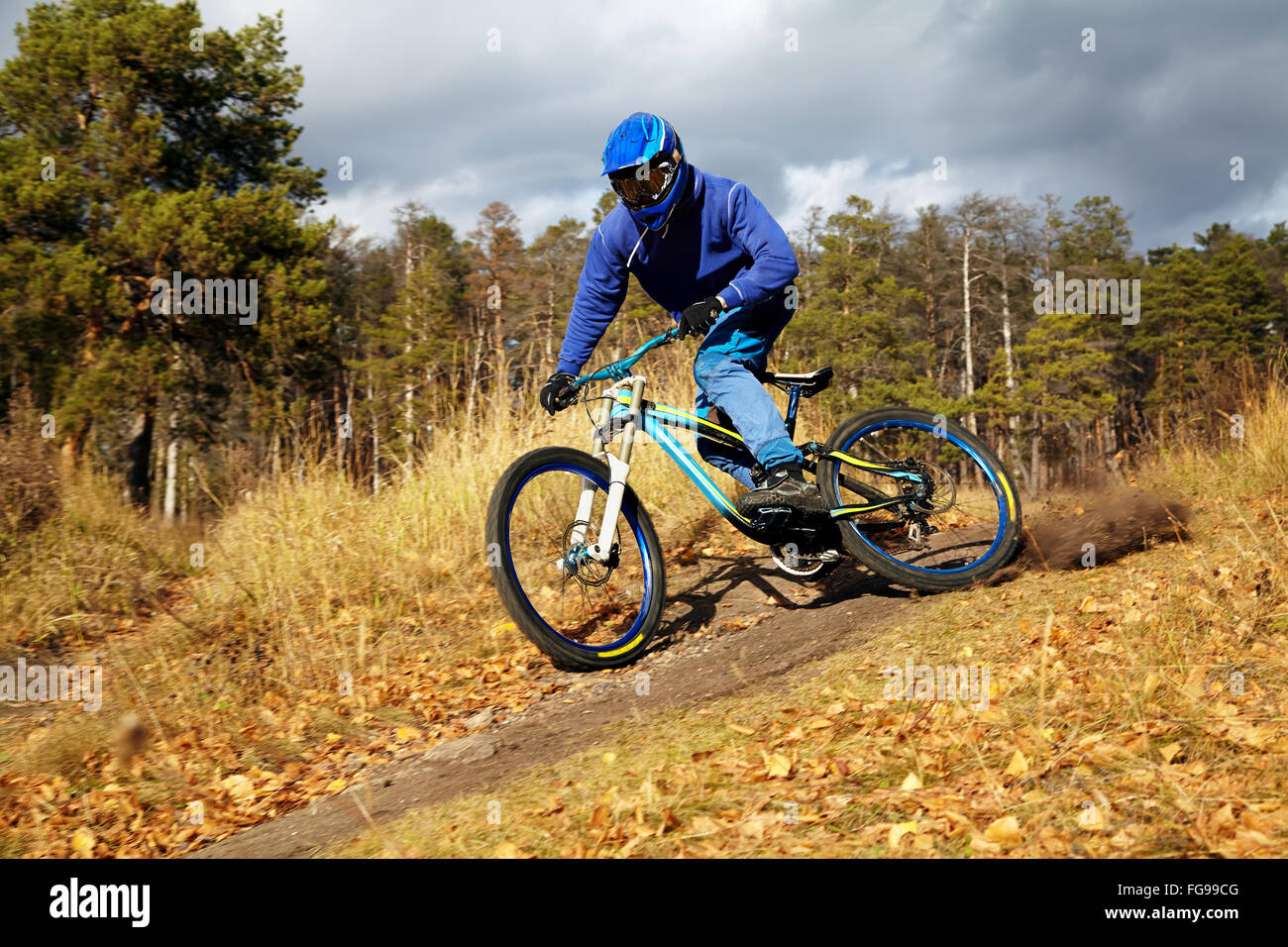 man riding a mountain bike Stock Photo - Alamy