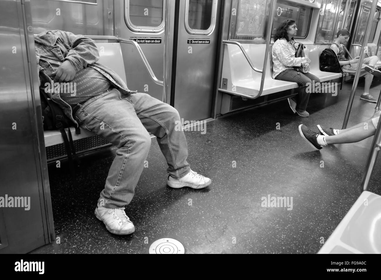 People riding the subway late at night in New York City Stock Photo - Alamy