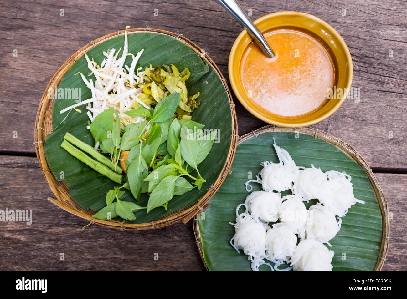 Rice noodles in fish curry sauce with vegetables is a popular Thai food ...