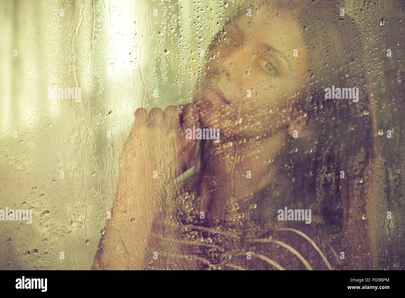 Woman Behind Window Drops High Resolution Stock Photography and Images ...
