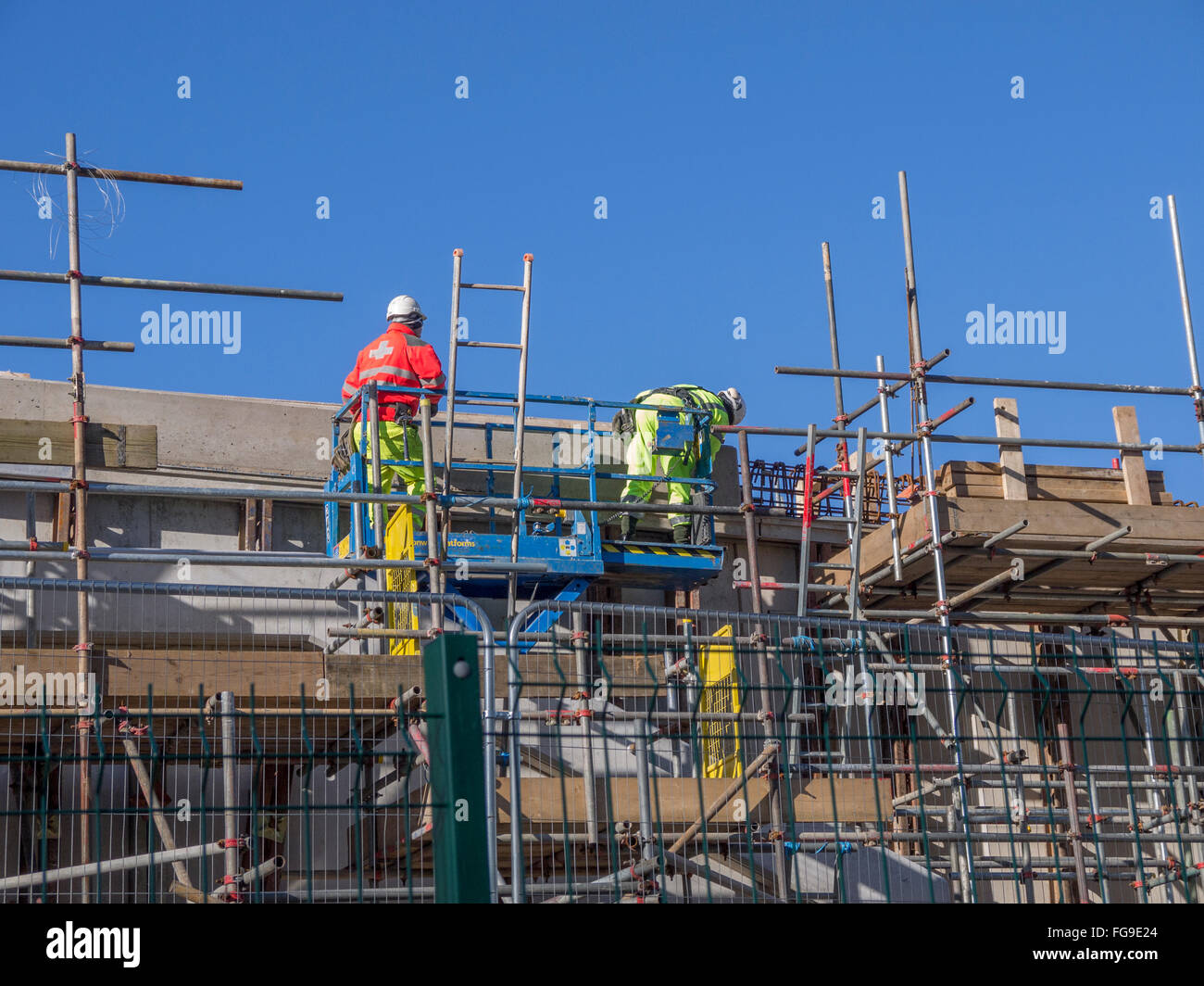Construction workers standing hi-res stock photography and images - Alamy