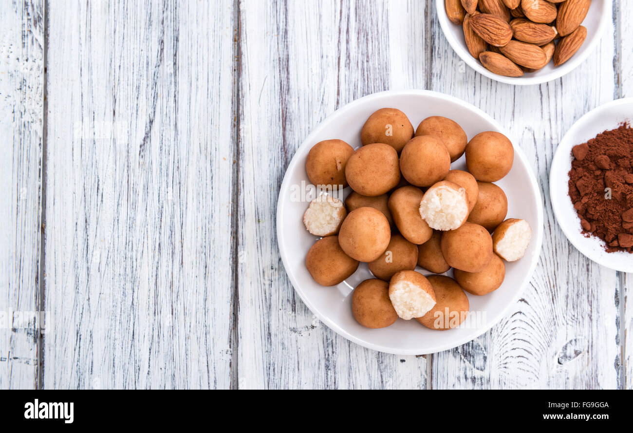 Portion of homemade Marzipan on rustic wooden background Stock Photo ...