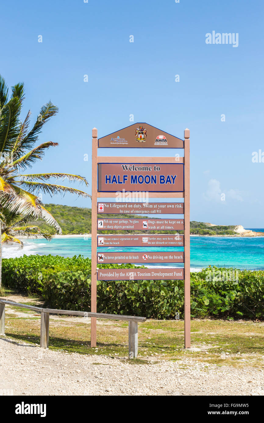 Name sign at the beautiful tropical Half Moon Bay, Antigua, with ...