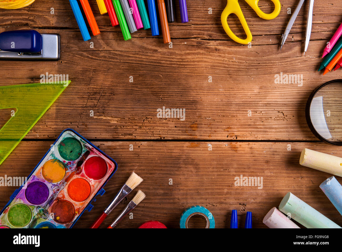 Desk with school supplies against wooden background, copy space Stock ...