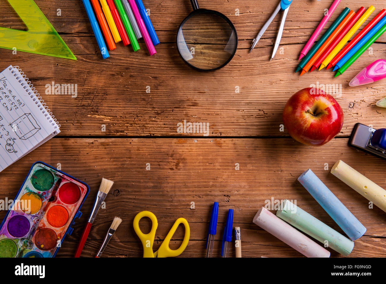 Desk with school supplies against wooden background, copy space Stock ...