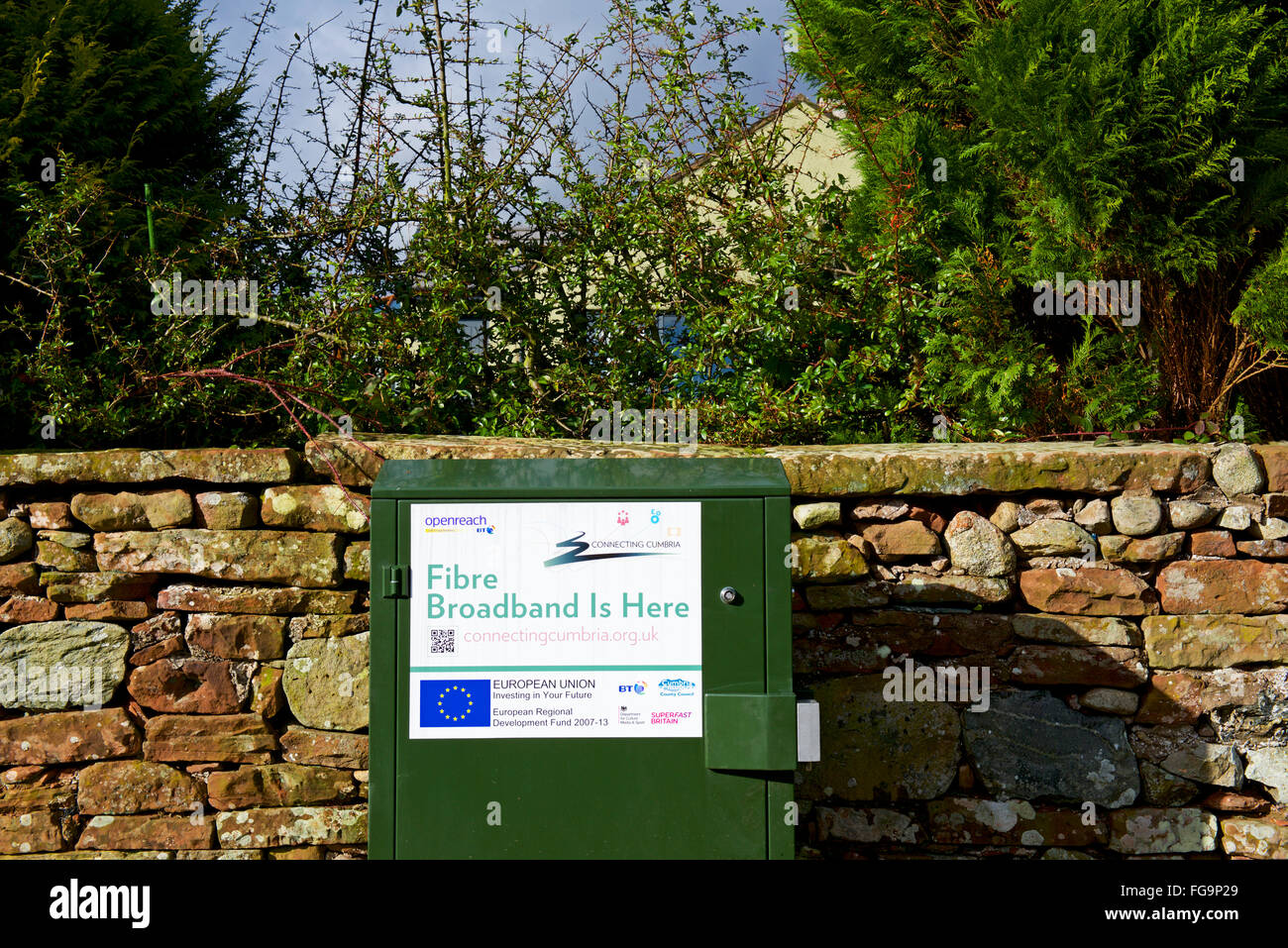 Sign about rural broadband in village, England UK Stock Photo - Alamy