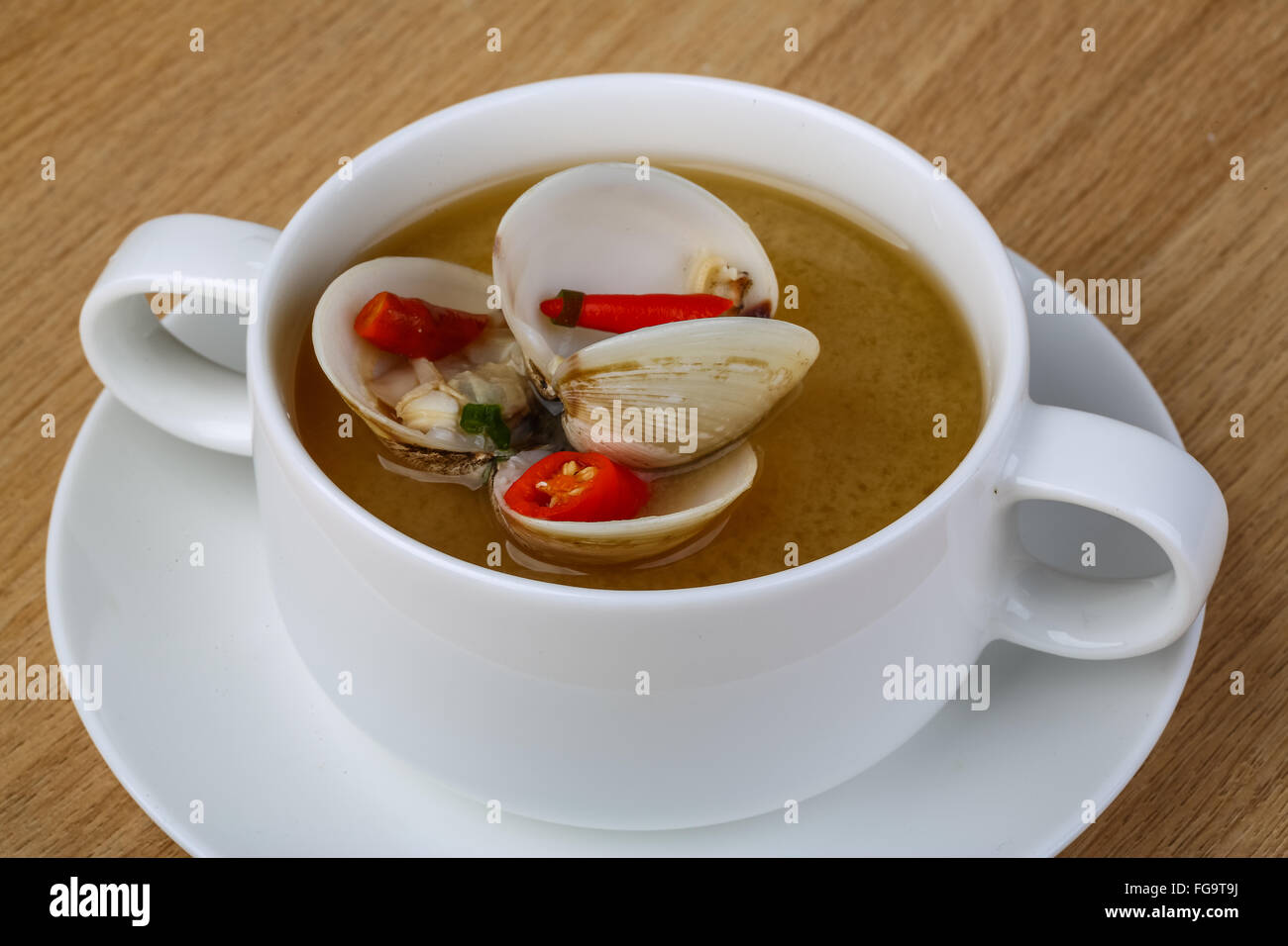 Asian traditional Shell soup on the wood background Stock Photo - Alamy