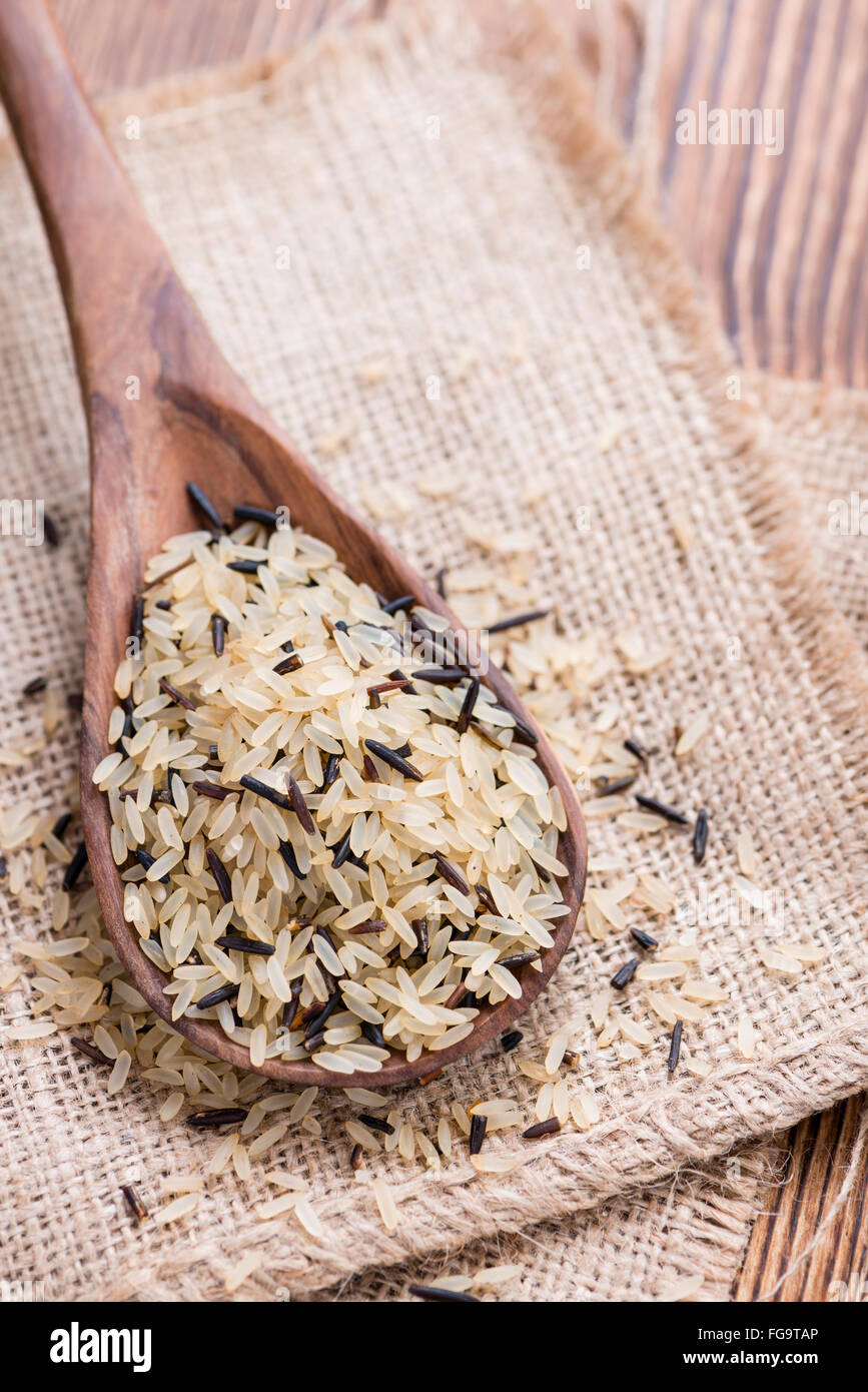 Rice (mixed with Wild Rice) on rustic wooden background Stock Photo - Alamy