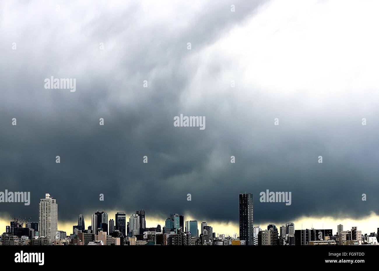 City Buildings Against Cloudy Sky Stock Photo - Alamy