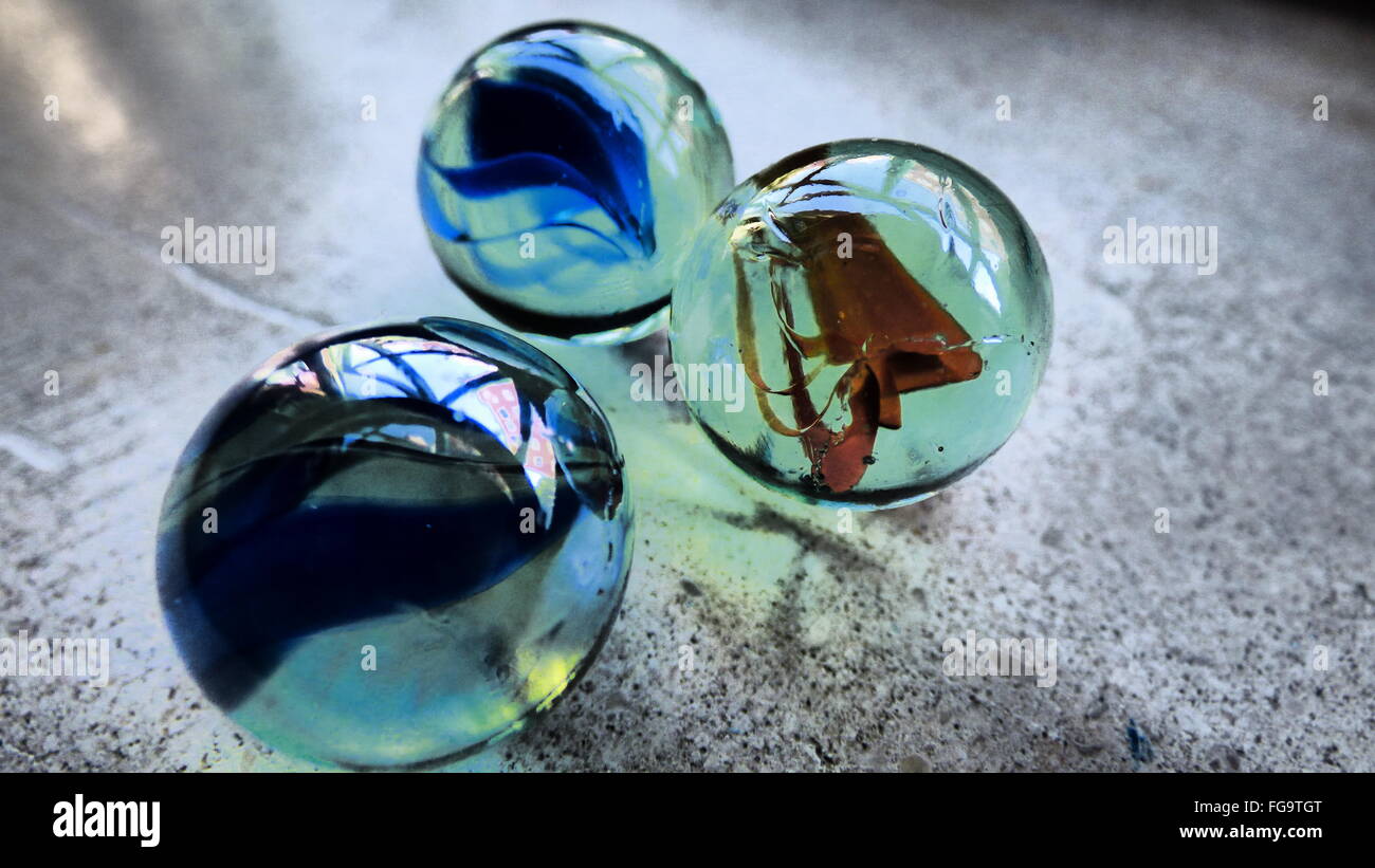 Various Marbles On Floor Stock Photo - Alamy