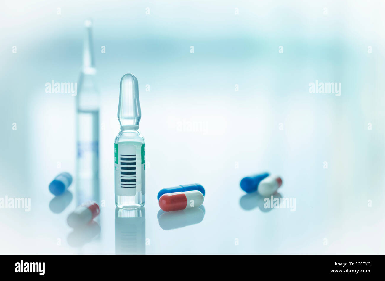 Glass vials and tablets Stock Photo - Alamy