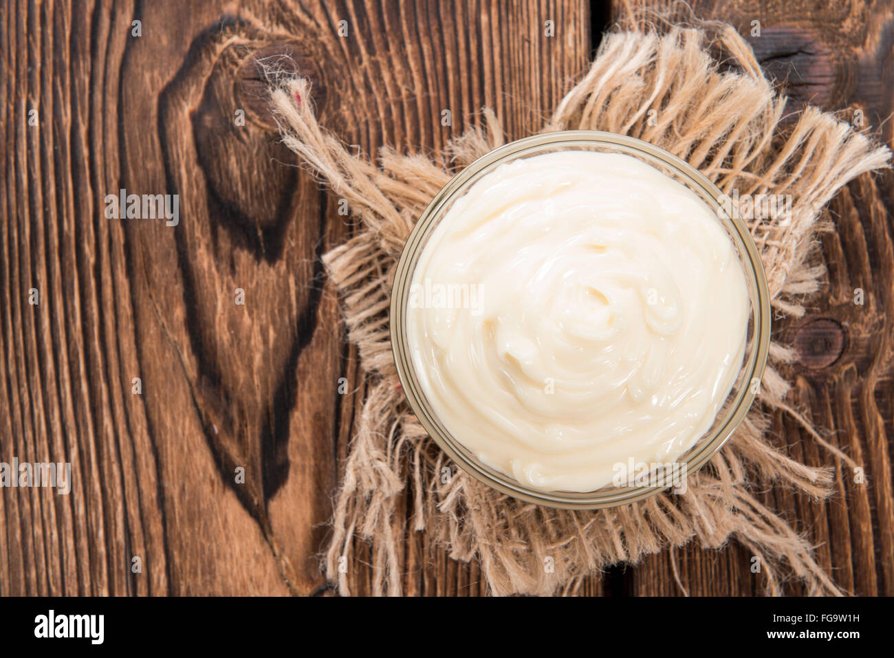 Portion of homemade Mayonnaise on an old wooden table Stock Photo - Alamy