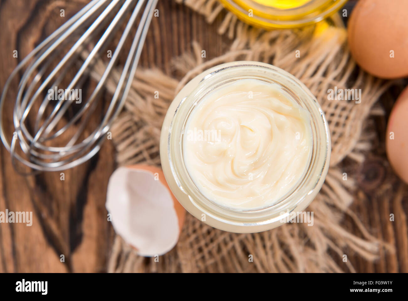 Portion of homemade Mayonnaise on an old wooden table Stock Photo - Alamy