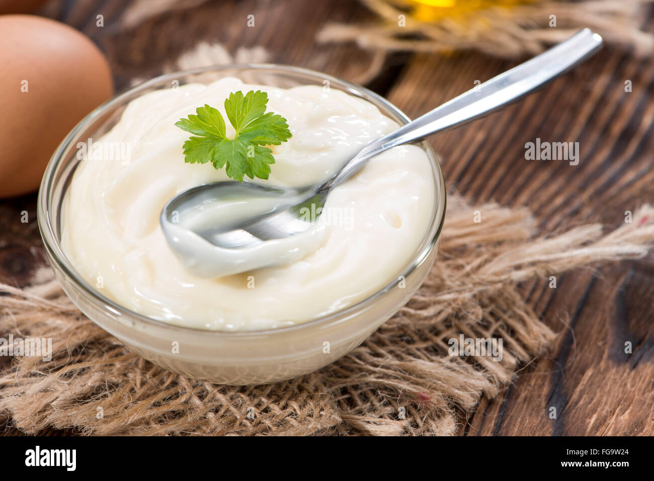 Fresh homemade Mayonnaise on an old wooden table (close-up shot Stock ...