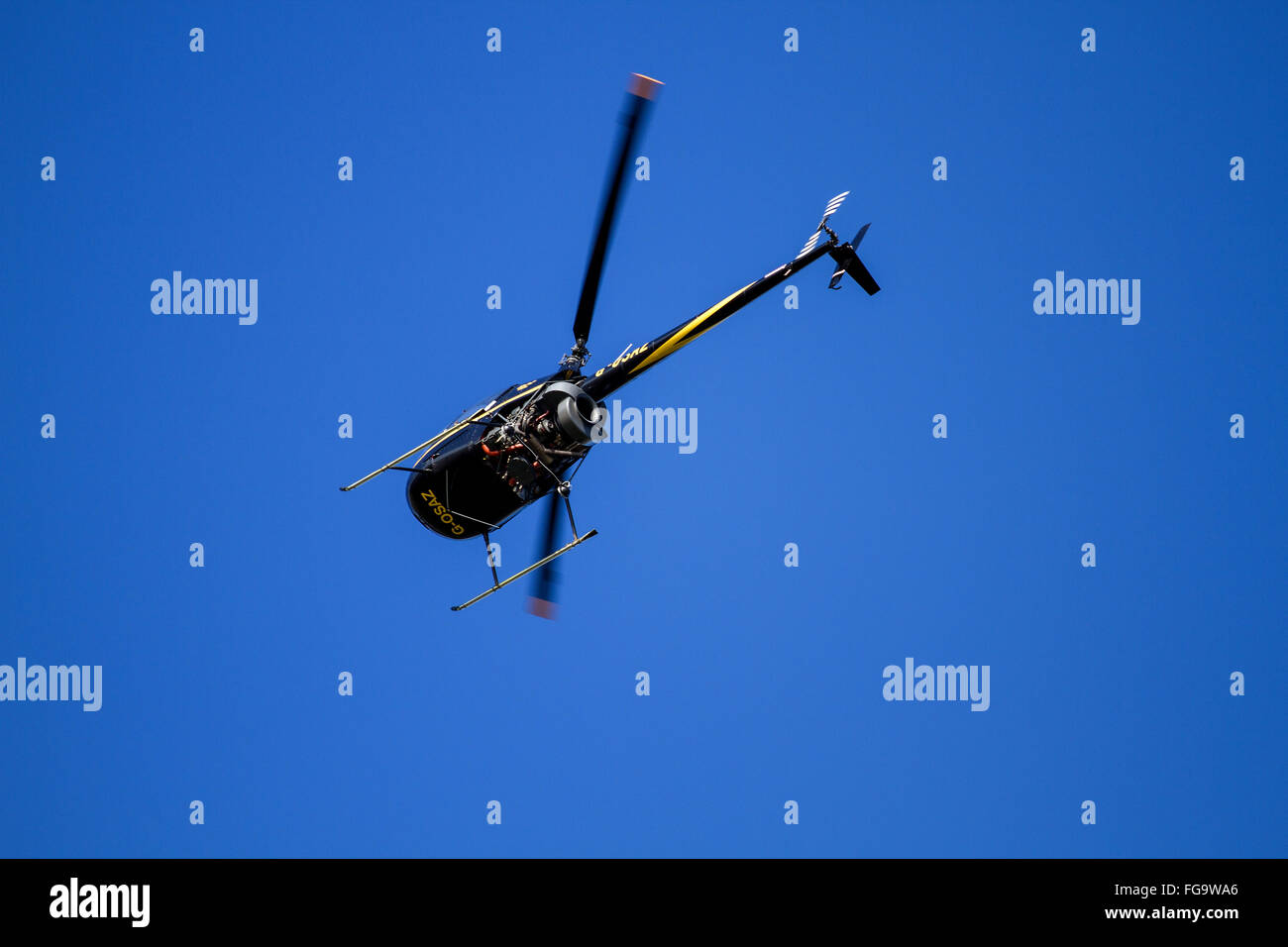 Robinson R22 G-OSAZ is a two-bladed single-engine light utility ...