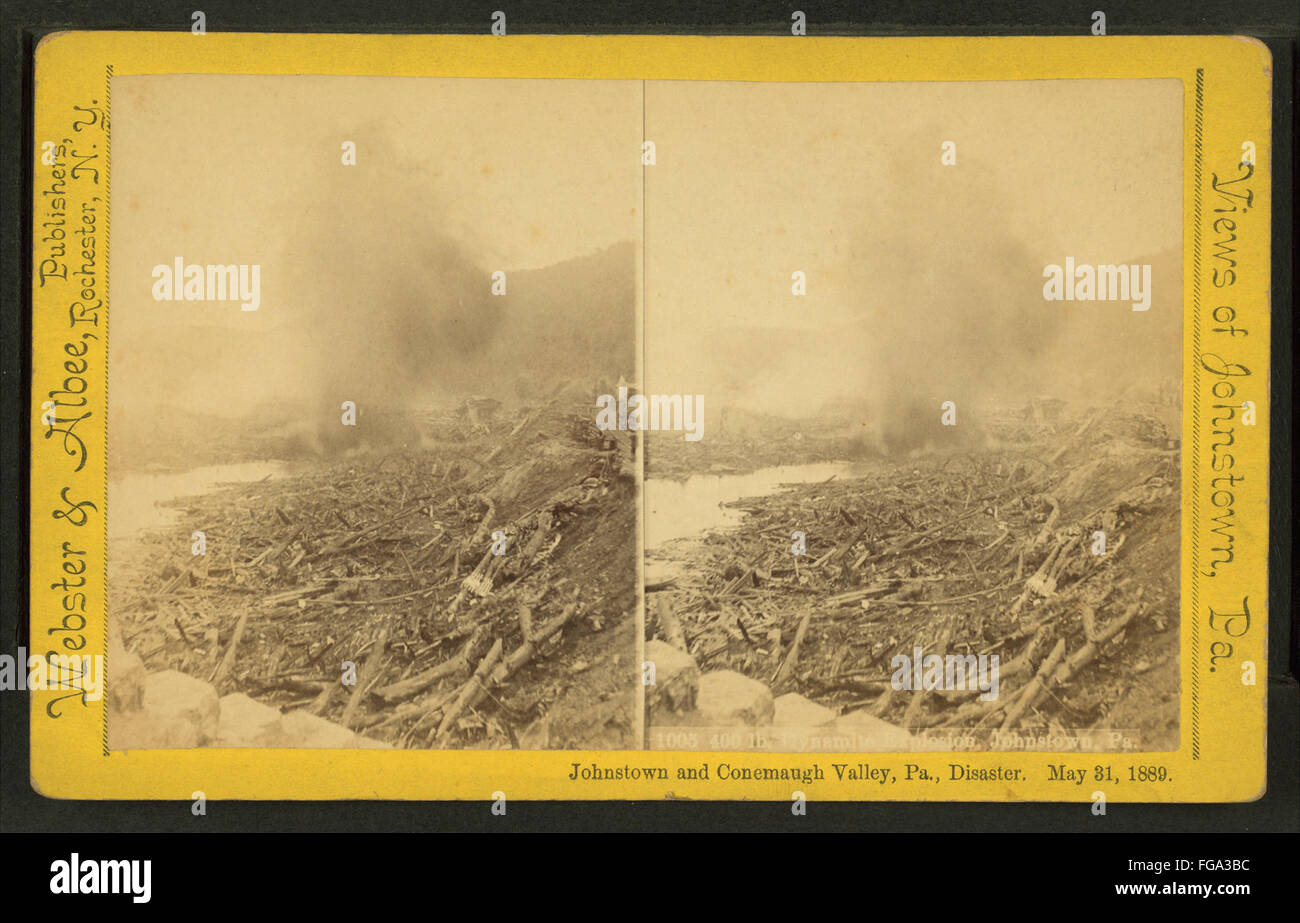 This historical photograph captures the moment of a 400 lb. dynamite ...