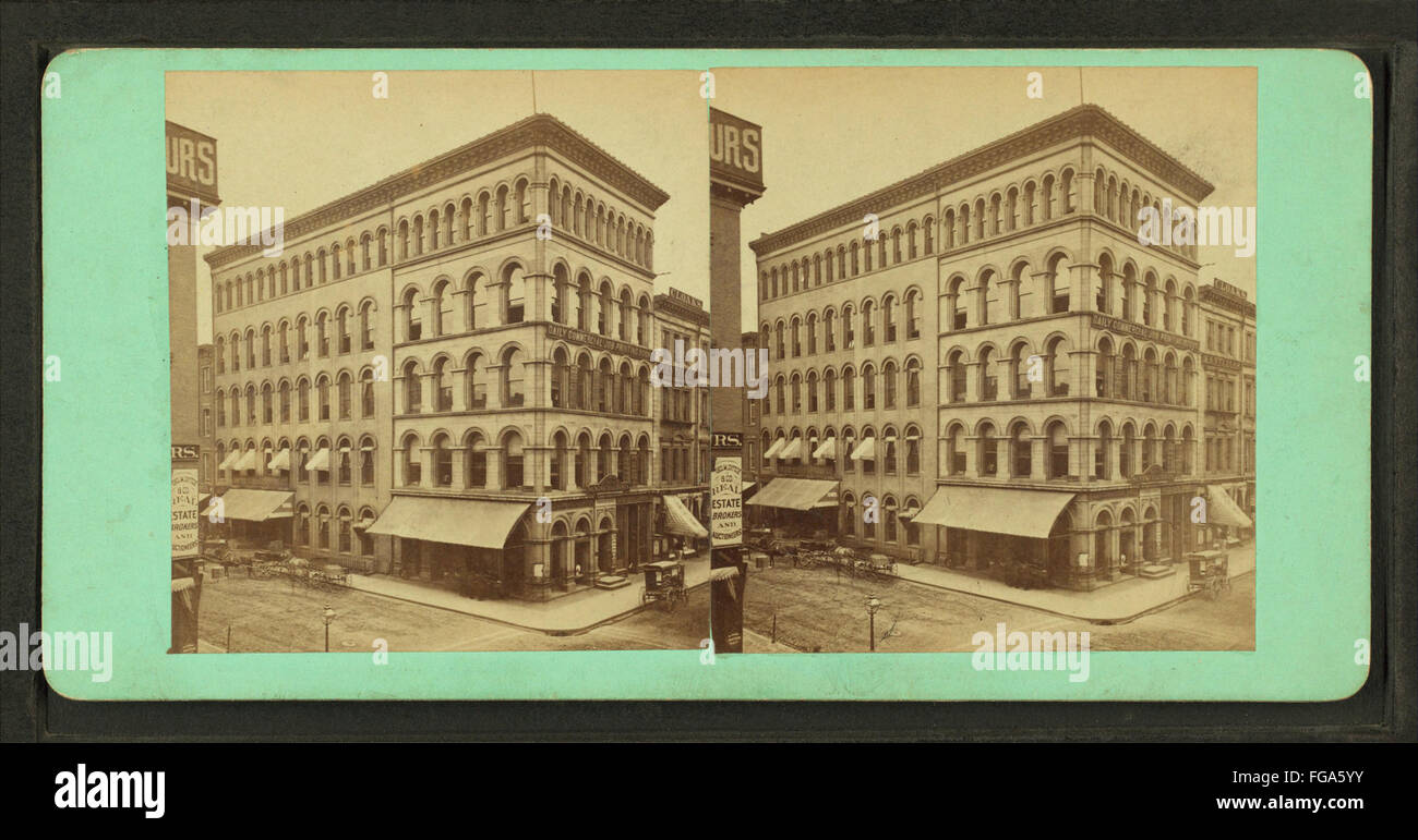A photograph by J.W. Winder showing the Daily Commercial building ...