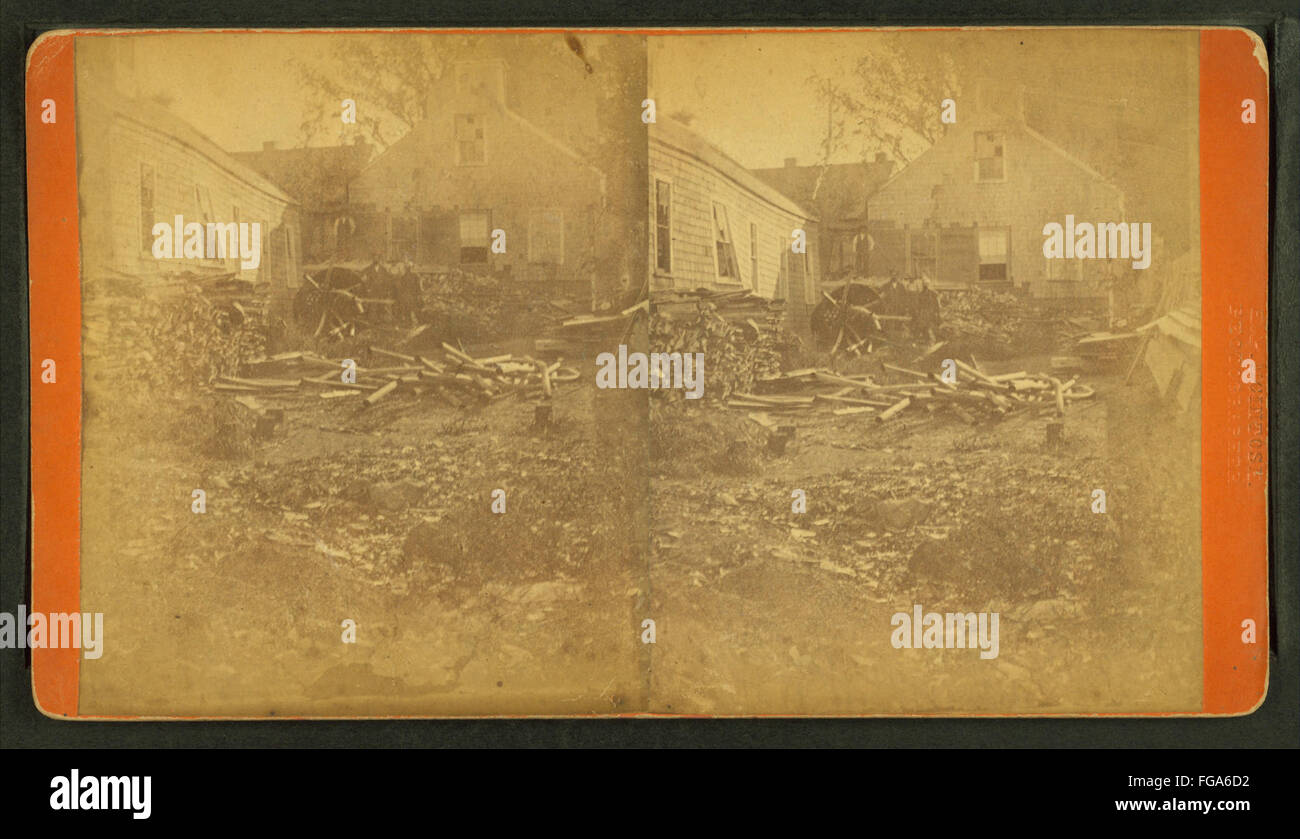 Photograph depicting debris and damaged buildings after an explosion ...