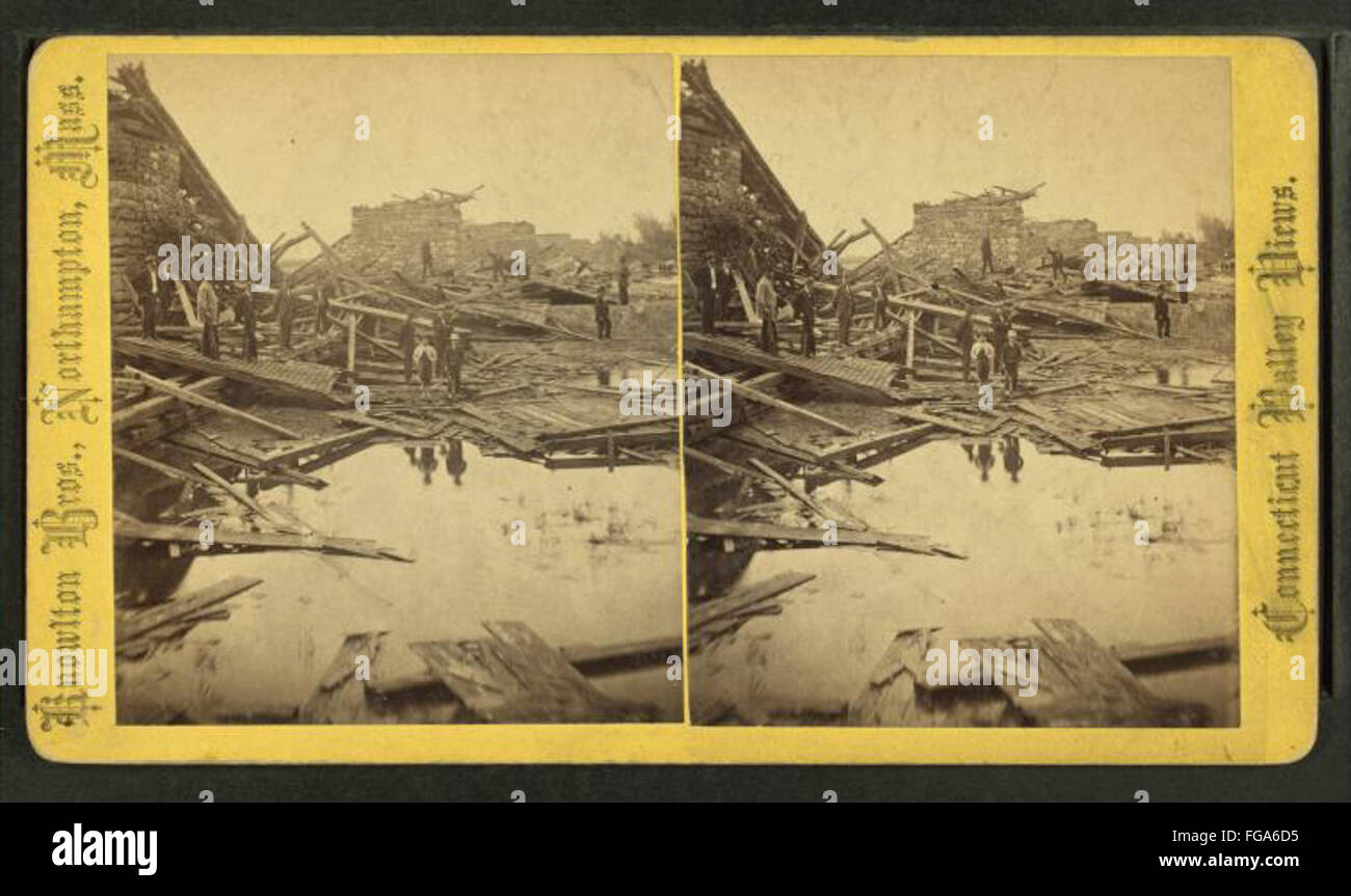 Photograph by Knowlton Bros showing debris surrounding a bridge ...