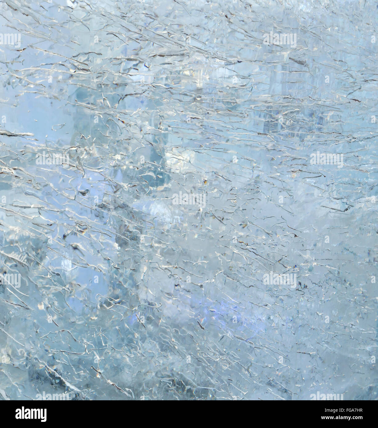 Glacial transparent wall of ice with interesting drawings and patterns ...