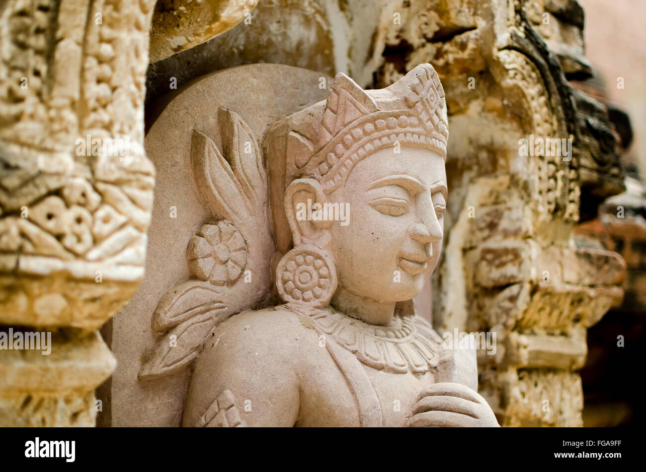 A praying statue Stock Photo - Alamy