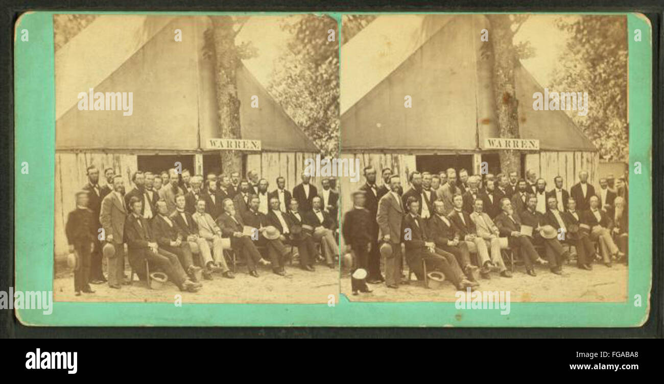 A formal photograph by C. H. Shute & Son featuring a group of men posed ...