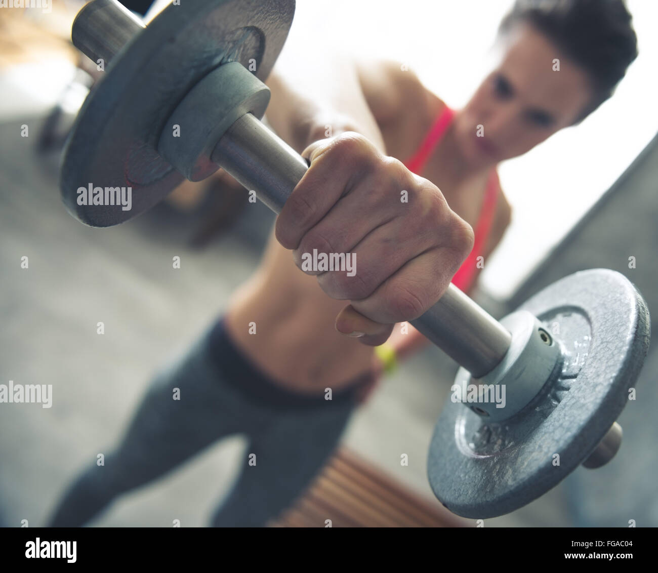 Body and mind workout in loft fitness studio. Closeup on fitness woman ...